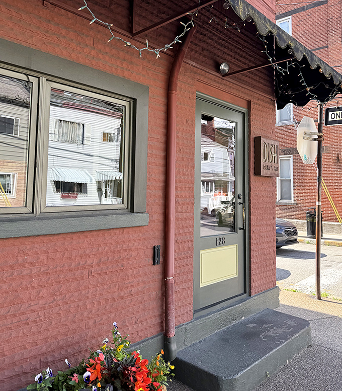 A corner entrance that's welcomed hungry souls for years, proving good food needs no fancy facade.