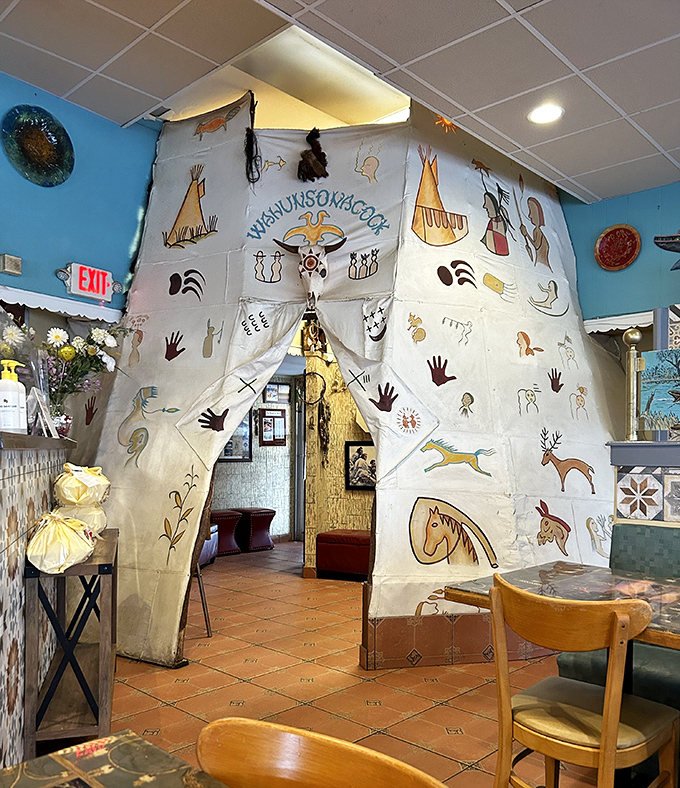 The Native American-inspired teepee entrance adds whimsy to your dining experience, proving breakfast doesn't have to be boring to be delicious.