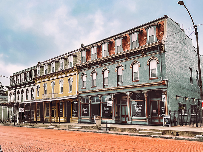 The pastel-hued storefronts along St. Louis Street create a picture-perfect small-town tableau. Like finding yourself inside a jigsaw puzzle your grandparents might assemble on a rainy Sunday.