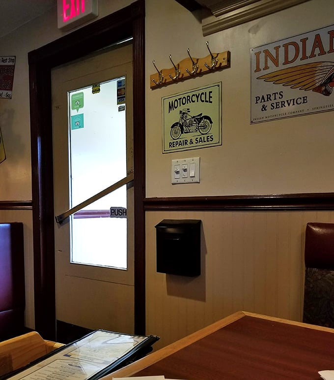 Vintage signs adorn the walls, creating an atmosphere that's part time machine, part comfort zone, and entirely welcoming.