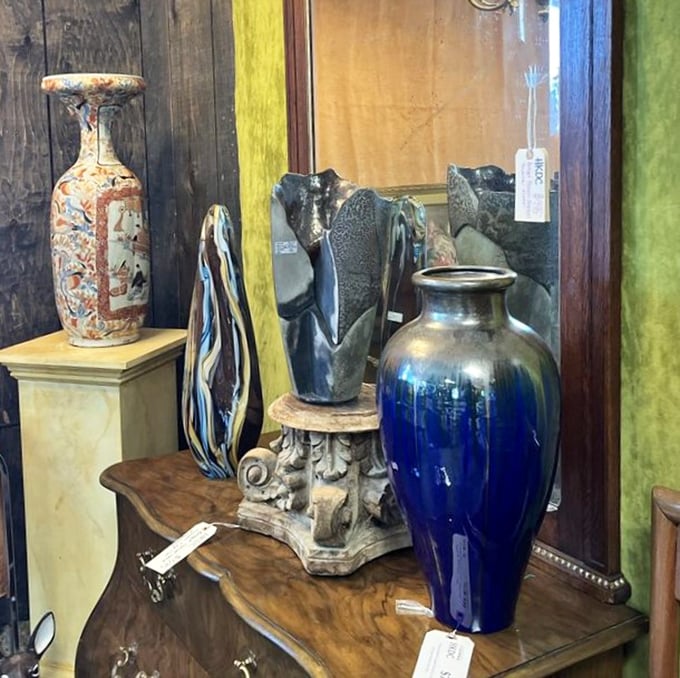 Vases that have outlived their original owners stand in dignified formation, ready for second acts in homes where they'll be conversation pieces again.