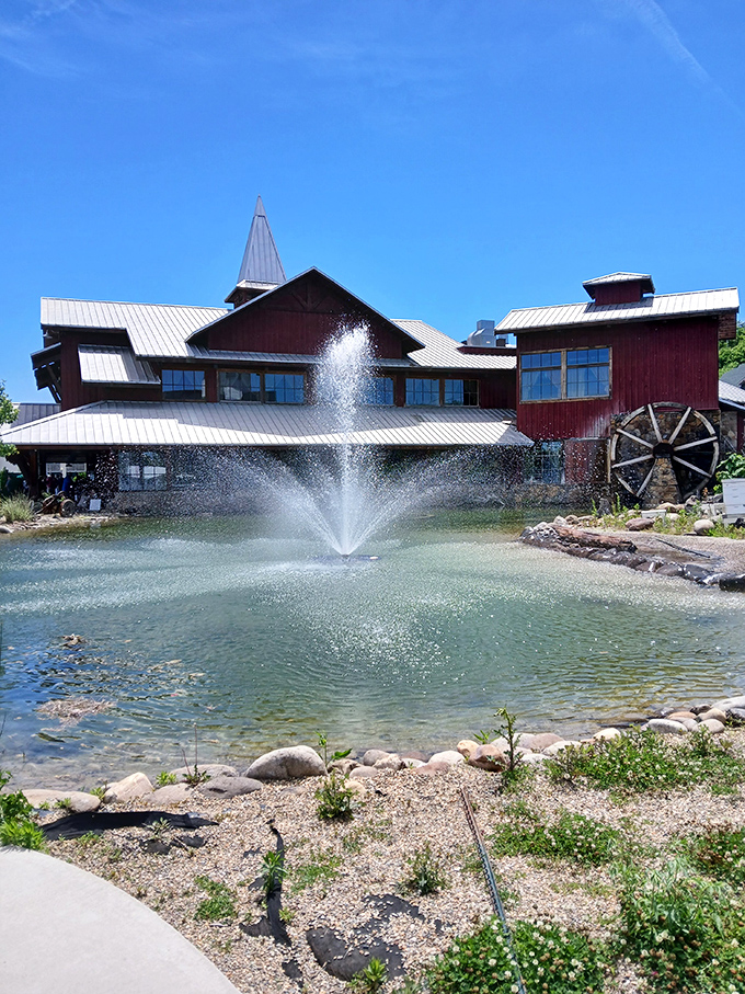 The fountain and red barn create a postcard-perfect scene that Instagram was probably invented for capturing beautifully.