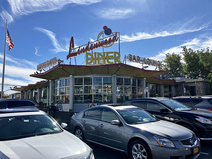 The diner's exterior against a perfect blue sky&mdash;like a mid-century postcard saying "Wish you were here eating pancakes."