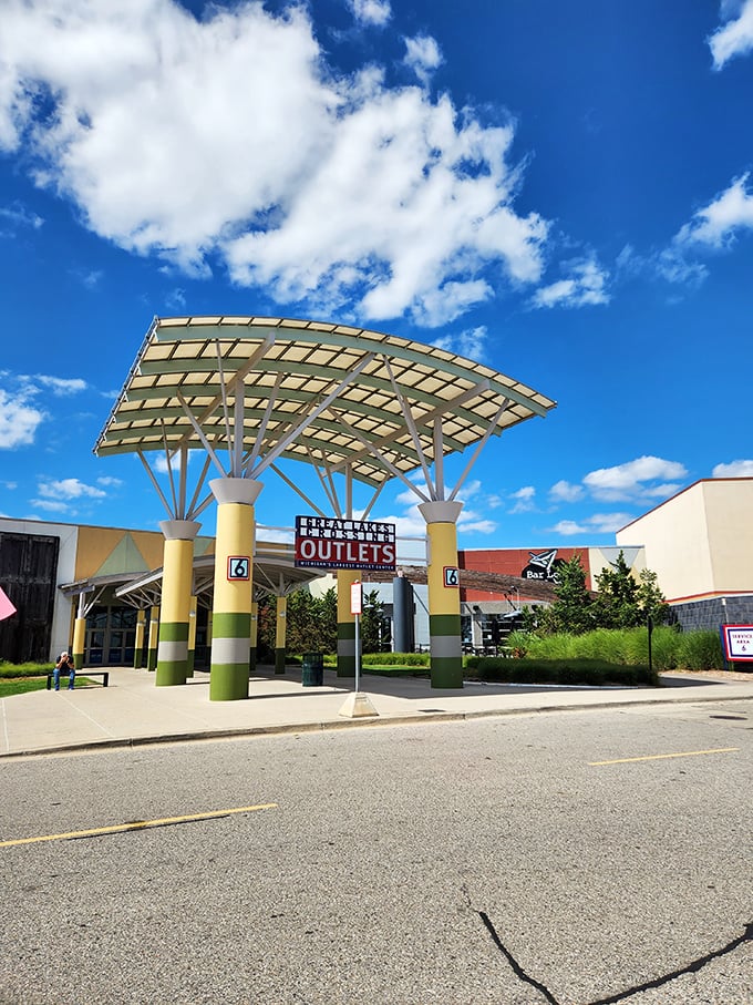 Blue skies frame the entrance on perfect shopping days, when the only clouds on the horizon are the ones in your bank account's future.
