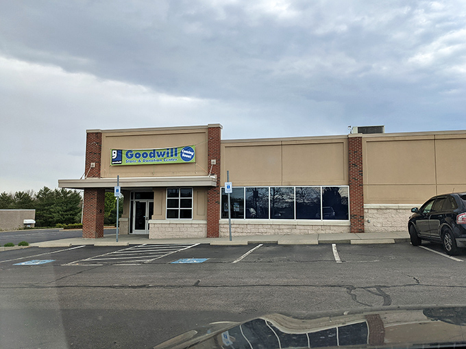 The Goodwill storefront stands ready for both donors and treasure-hunters. Where the cycle of giving and discovering begins anew.