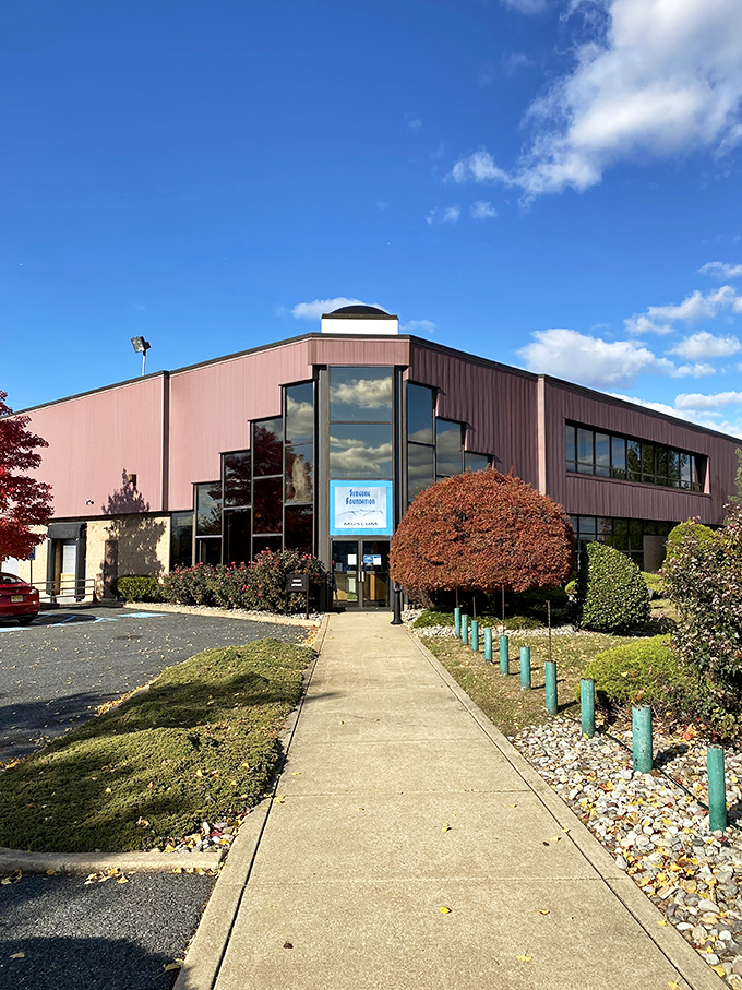 From this angle, you'd never guess that beyond these doors lies one of the world's greatest collections of racing sports cars.