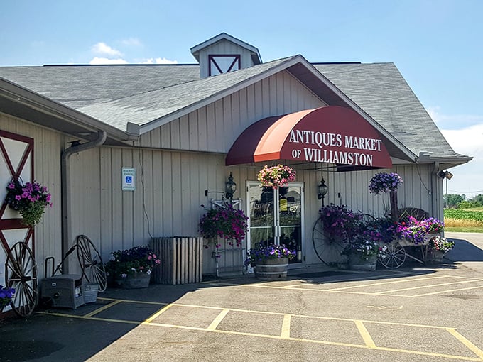 Summer blooms frame the entrance to this vintage paradise. Even the building itself feels like a step back in time.