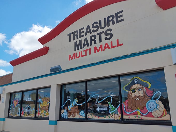 The pirate-themed window art promises adventure inside&mdash;X marks the spot where bargain hunters find their retail treasure.