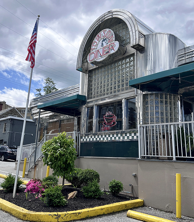 The diner's architectural details shine even on cloudy days, its glass blocks and curved facade a testament to mid-century design that never goes out of style.