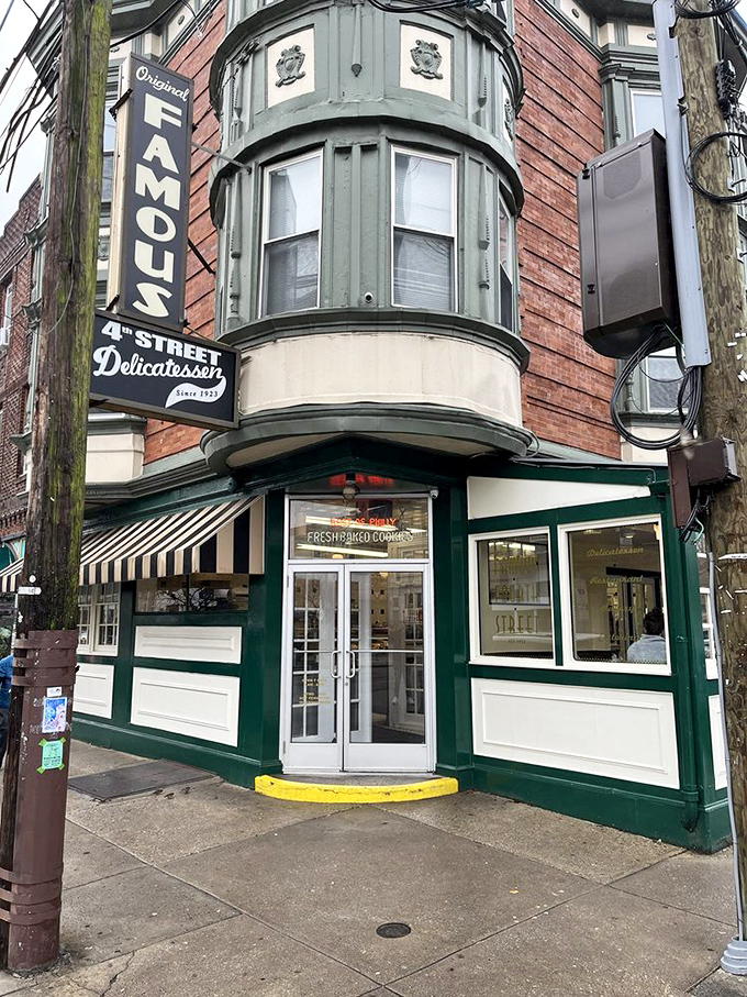 The welcoming entrance with its classic green and white fa&ccedil;ade promises an authentic deli experience that hasn't been watered down by time or trends.