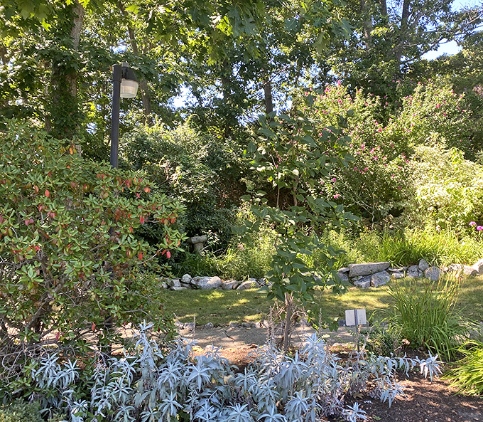 Gardens surrounding the castle blend formal European design with New England's natural beauty—a horticultural handshake across centuries.