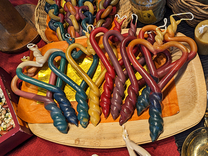 Twisted rainbow candles that look like they escaped from Willy Wonka's factory. Hand-dipped beeswax transformed into colorful sculptures too pretty to burn.