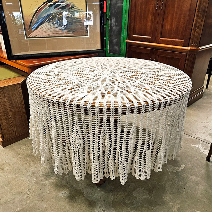 Someone's grandmother spent months creating this intricate crocheted tablecloth masterpiece, and now it can grace your dining room for pocket change.