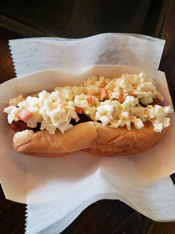 The lobster roll's midwestern cousin &ndash; a hot dog elevated with a generous crown of homemade seafood salad.