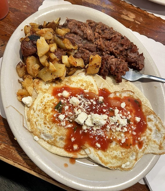 Huevos rancheros that bring a fiesta to your morning. That sprinkle of feta cheese is the plot twist your breakfast didn't know it needed.