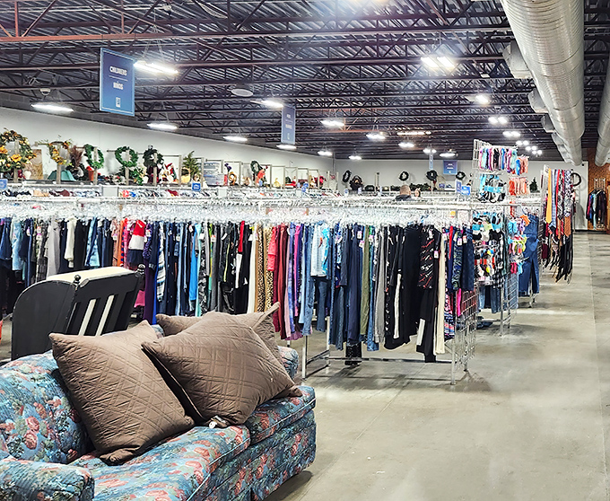 The clothing department stretches into the distance like a fabric forest. Each rack contains potential wardrobe revivals and style rediscoveries.