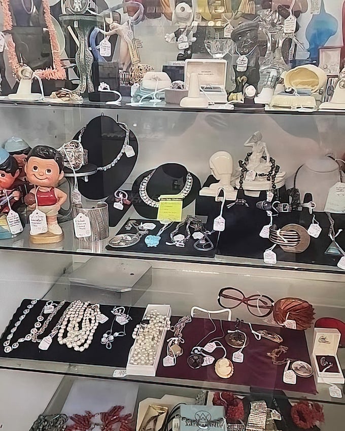 Jewelry from bygone eras sparkles under display lights, each piece whispering secrets of formal dances, anniversary celebrations, and promises made decades ago.
