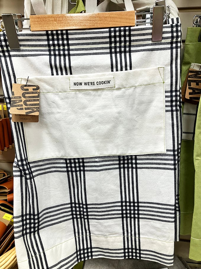 "Now We're Cookin'" indeed! An apron that protects your clothes while simultaneously announcing your questionable confidence in the kitchen.