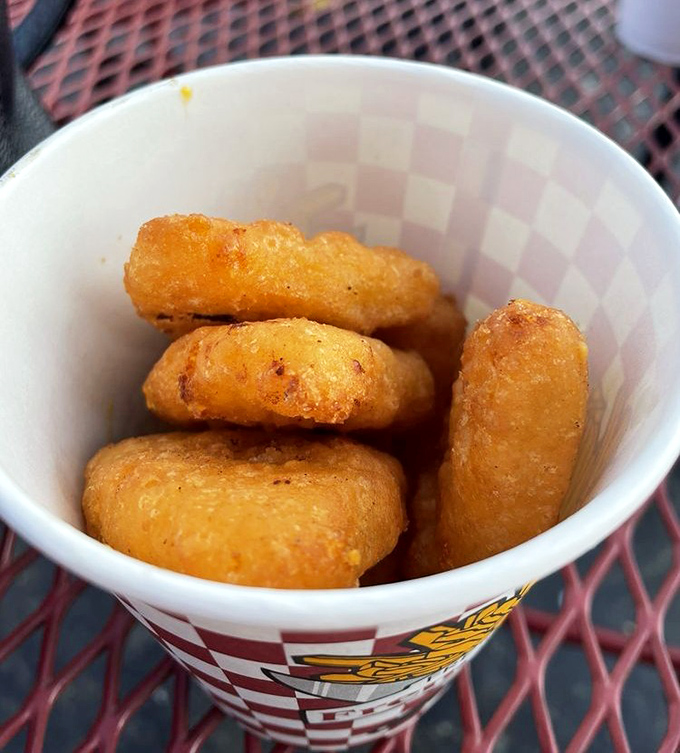 Mac & cheese bites&mdash;because sometimes you need your comfort food portable and dippable. Golden-fried nuggets of childhood nostalgia that adults can't resist.