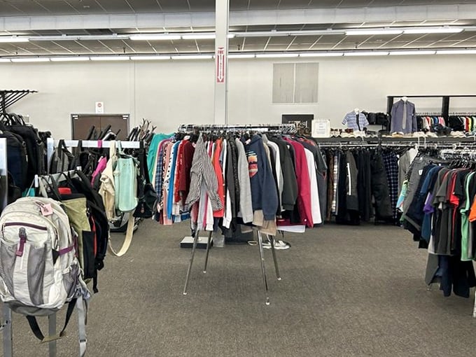 Men's clothing arranged with care&mdash;proof that organization is the secret ingredient in the recipe for thrift store success.