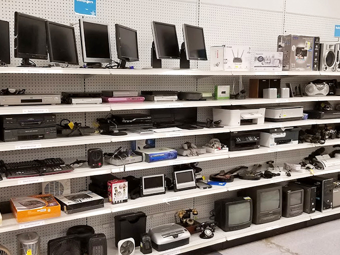 The electronics graveyard where yesterday's cutting-edge technology finds new purpose. That monitor might be outdated, but it still has pixels to give!