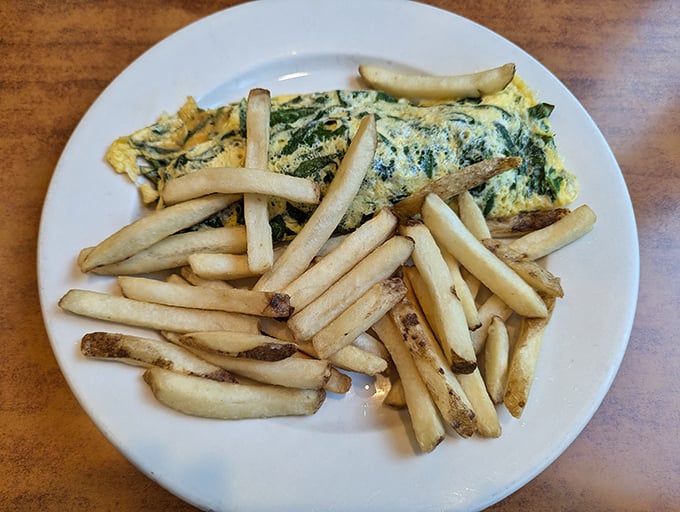 The perfect omelet is like a good marriage&mdash;what's inside matters, but technique is everything. These fluffy eggs with crispy fries are breakfast bliss.