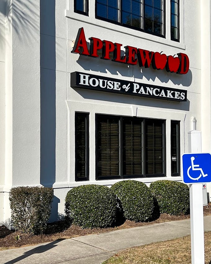 The signature Applewood sign stands as a promise of good things to come&mdash;like the opening credits to your favorite food show.