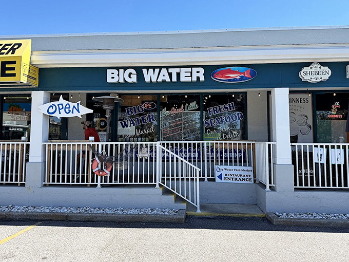 The fish-shaped "OPEN" sign might as well say "PARADISE FOUND"&mdash;a beacon of hope for hungry seafood lovers navigating Siesta Key's shores.