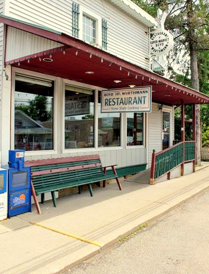 The vintage charm of Boyd & Wurthmann's exterior beckons hungry travelers. That bench outside isn't just seating&mdash;it's where you'll rest while contemplating a second slice of pie.
