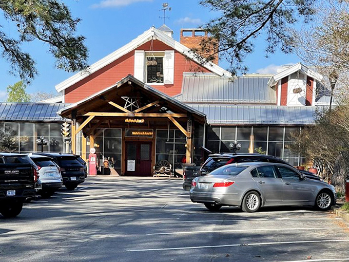 The daylight view reveals the true charm of this red barn structure. Not just a restaurant, but a landmark on Raleigh's culinary map.