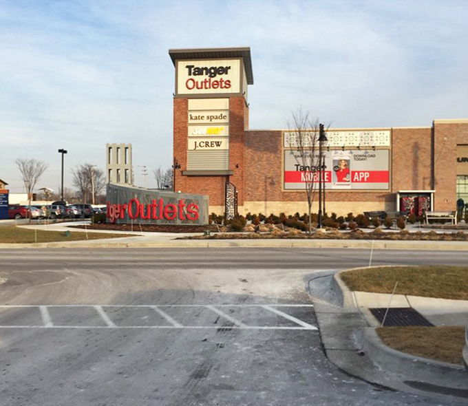The exterior signage visible from the highway acts like a siren song calling bargain hunters from miles around Michigan.