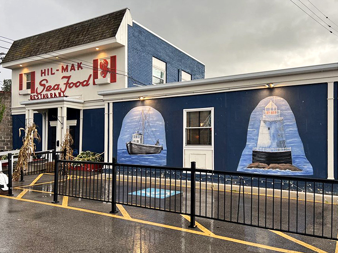 Those fishing boat murals are so charming you half expect them to sail away with your leftovers onboard.