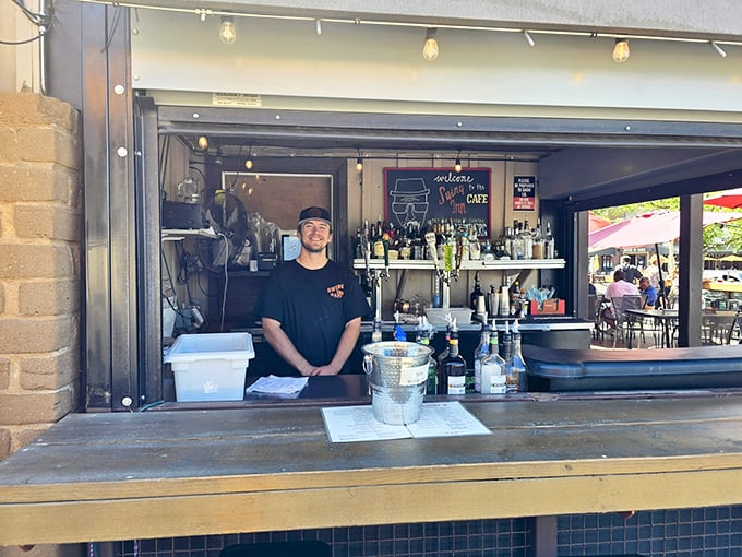 The outdoor bar serves up liquid courage for those about to face the menu's most formidable challenge: deciding what to order.