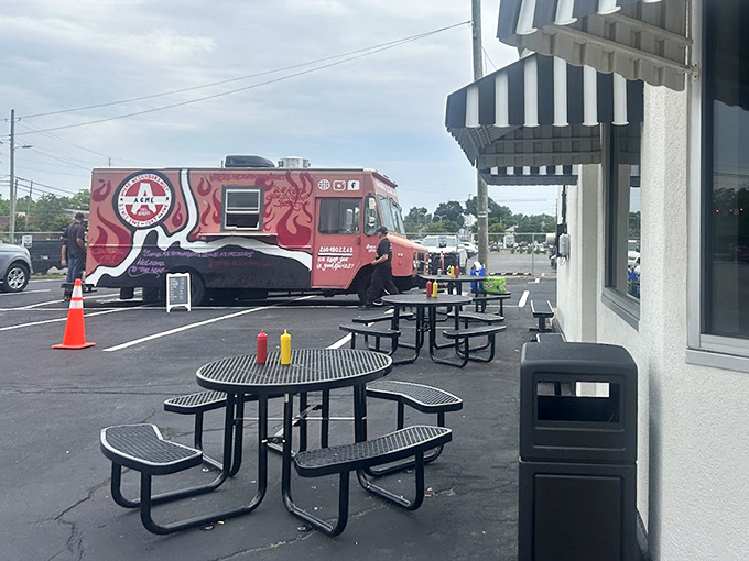 Outdoor seating and a visiting food truck show how Powers remains a hub of community dining, bringing people together over great food.