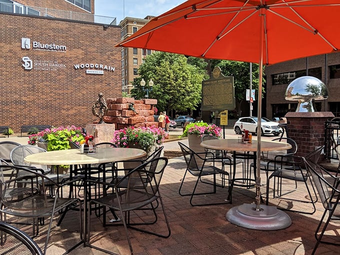 Outdoor seating where summer breezes complement your coffee, proving that some pleasures in life are simple but perfect.