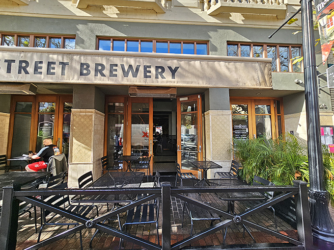The outdoor patio &ndash; where fresh air enhances every bite and sip. Those black metal chairs have supported countless happy diners watching the world go by.