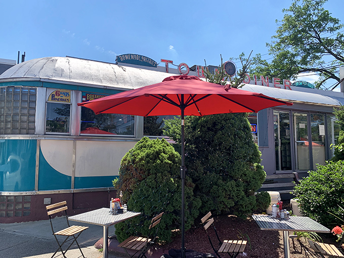 Outdoor seating for when your pancake high requires fresh air. That red umbrella isn't just for shade&mdash;it's a beacon for breakfast pilgrims.
