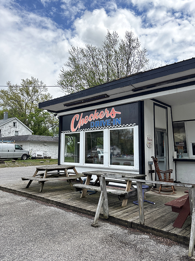 Weather-worn picnic tables that have hosted countless summer meals and conversations&mdash;silent witnesses to burger joy.