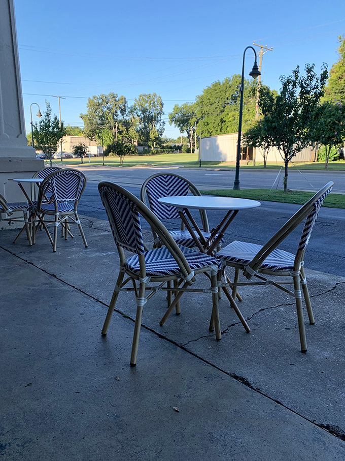 The outdoor seating area offers front-row tickets to the simple pleasure of watching the world go by, croissant in hand.
