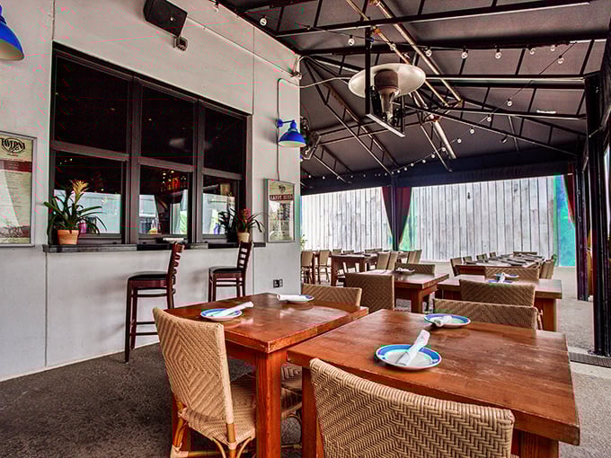 The outdoor patio offers a taste of Aegean al fresco dining in Florida's perpetual summer. Simple wooden tables set the stage for extraordinary flavors.