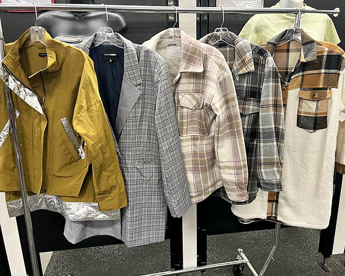 The outerwear collection spans seasons and styles, from mustard yellow statement pieces to cozy plaid shackets perfect for Rochester's fickle weather.