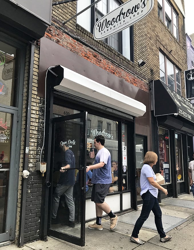 The entrance to Woodrow's &ndash; where ordinary pedestrians enter and emerge as enlightened sandwich enthusiasts with slightly tighter pants.