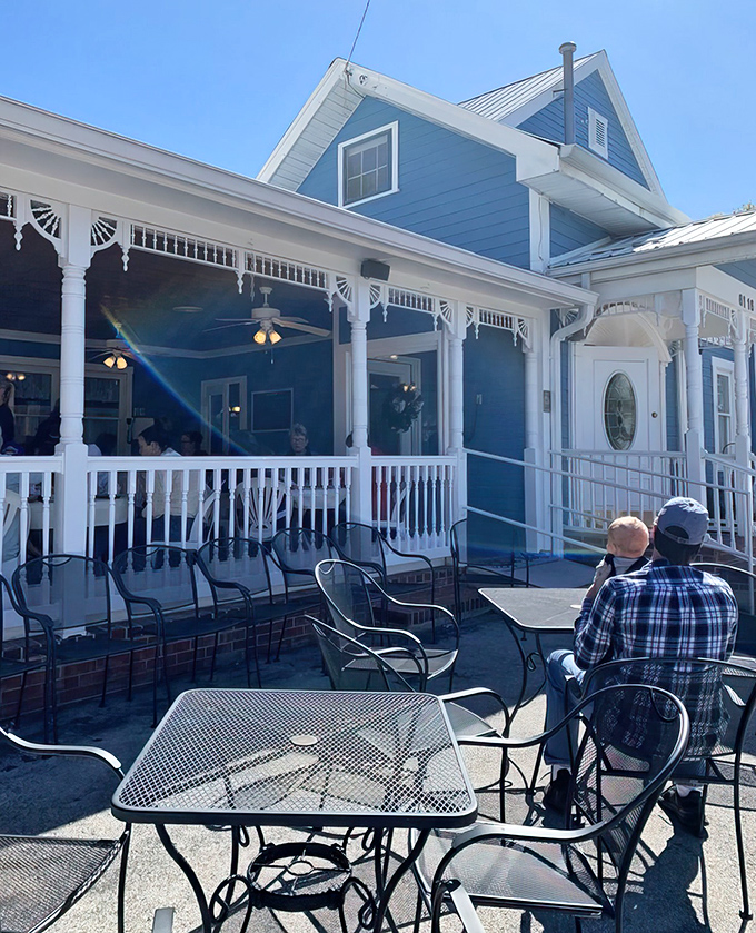 The Blue Owl's wraparound porch invites you to linger, digest, and plan your next visit before you've even left.