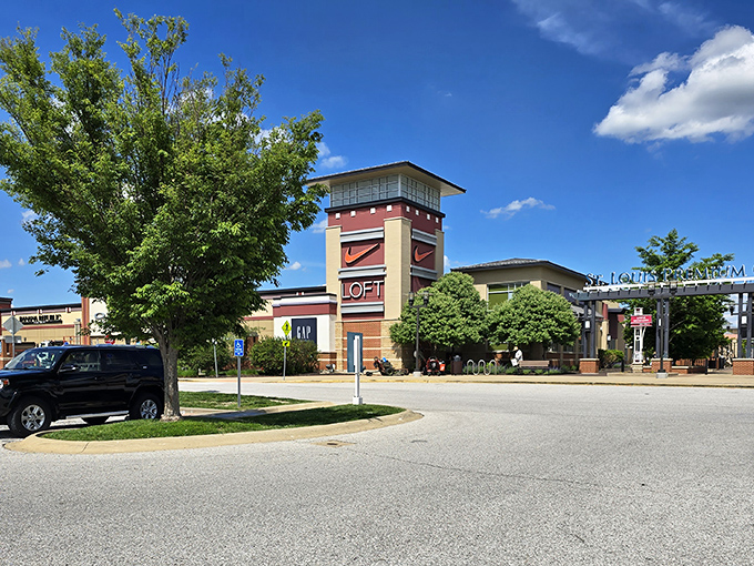 Brand names tower above storefronts like beacons of savings, guiding shoppers toward their next incredible find and deal.