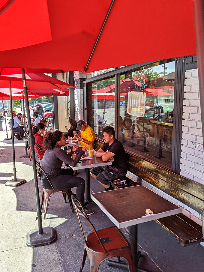 Outdoor dining where conversations flow as freely as the coffee. These tables have heard first dates, business deals, and Sunday morning recovery stories.