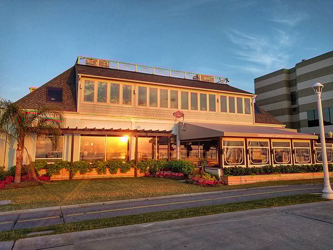Sunset bathes Waterman's in golden light, transforming an already charming restaurant into something that belongs on a postcard you'd send to make friends jealous.