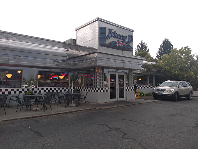 Even at dusk, Johnny J's glows with promise. Those outdoor tables whisper of summer evenings and coffee that never gets cold.