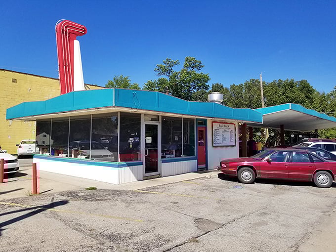 Mid-century modern meets Midwest charm in this architectural time capsule. The turquoise awning has sheltered generations of Kansans from both sun and hunger pangs.