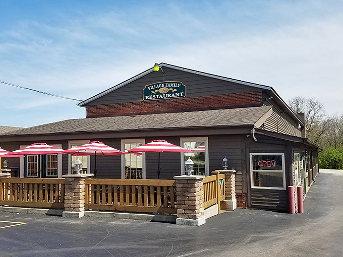 Red umbrellas stand at attention outside, like cheerful sentinels guarding the entrance to this temple of home-style cooking.