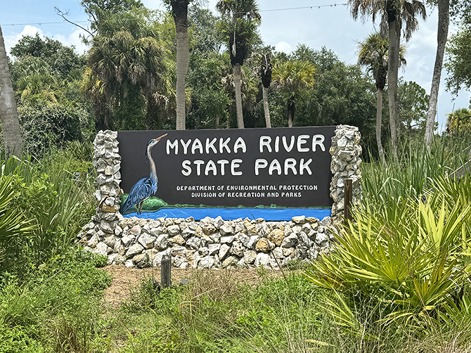 The park entrance sign promises adventure with a blue heron as your spirit guide&mdash;nature's version of "you are now entering awesome."